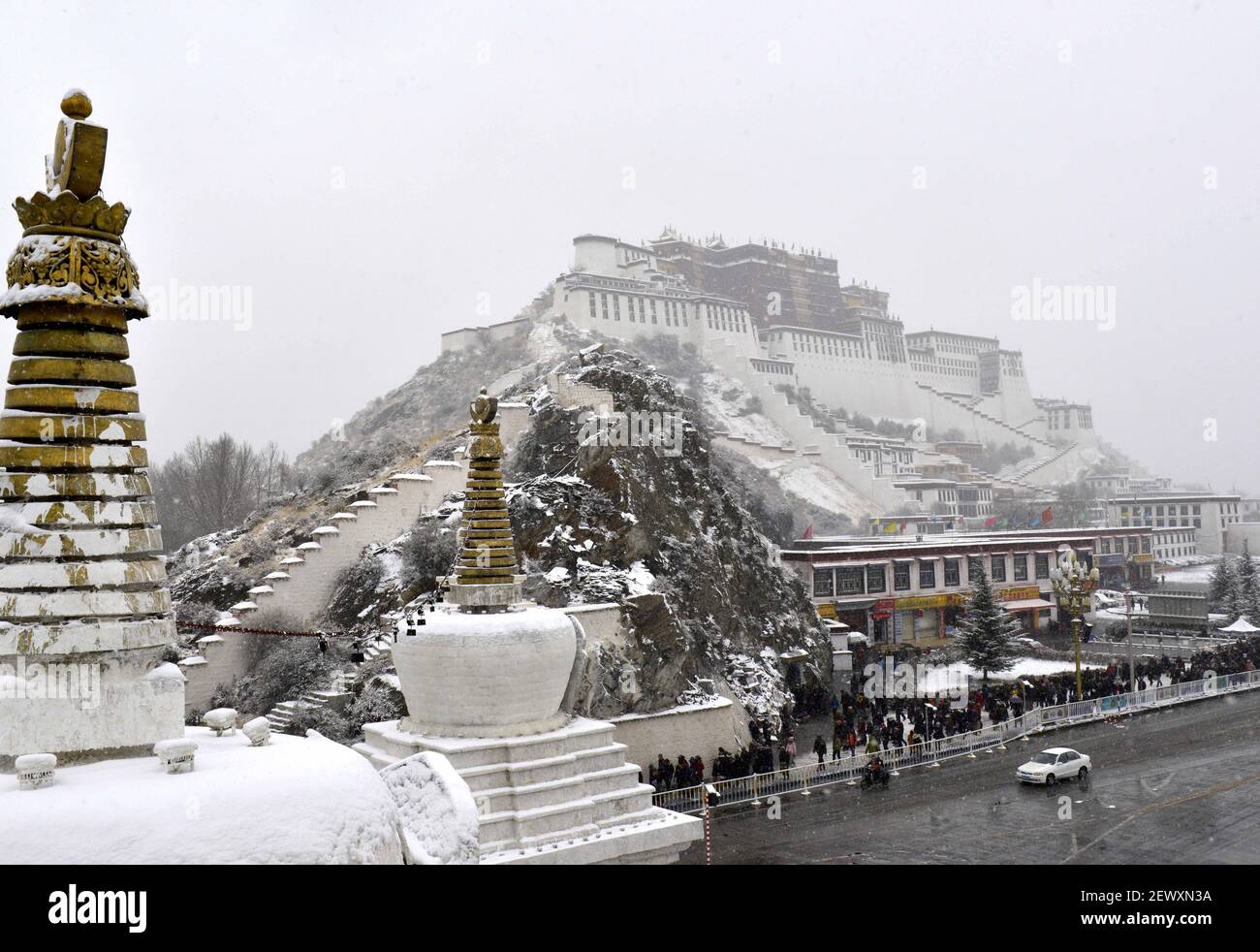 The religious people kowtowing in front of Jokhang Temple to welcome ...