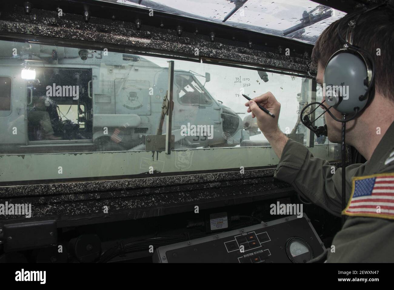 JAVA SEA (Jan. 3, 2015) Lt. Kellen Odom, assigned to Helicopter ...