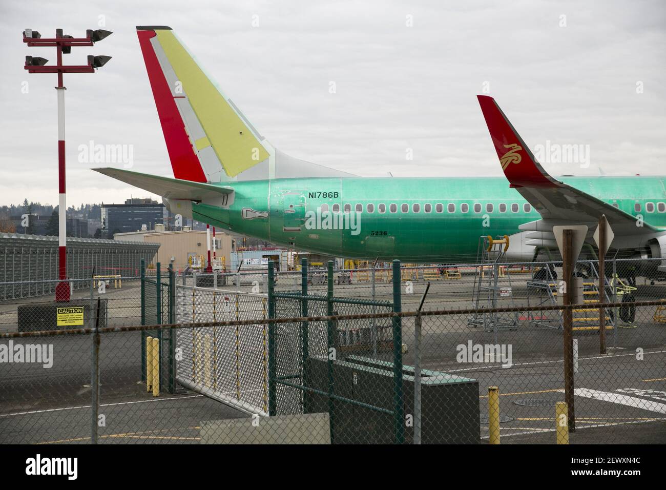 Boeing 737 aircraft await painting at the Boeing Renton Factory, where ...