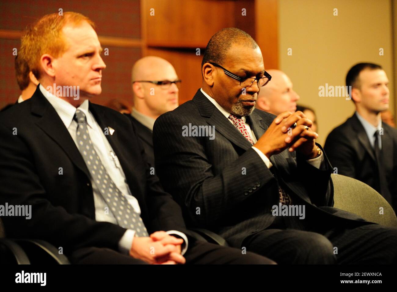 Commander Kevin Modica, center, was promoted to assistant chief of the ...