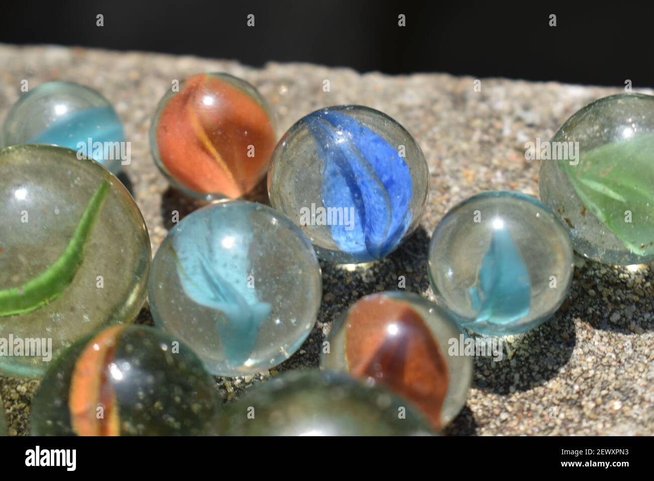 Hand flicking marble hi-res stock photography and images - Alamy