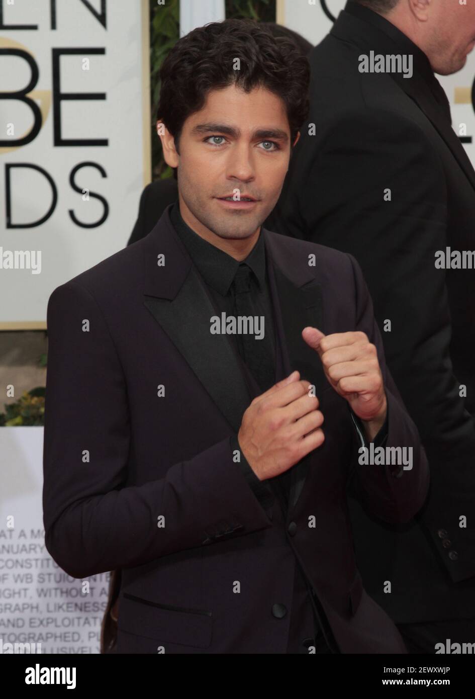 Actor Adrien Grenier arrives at the 72nd Annual Golden Globe Awards ...