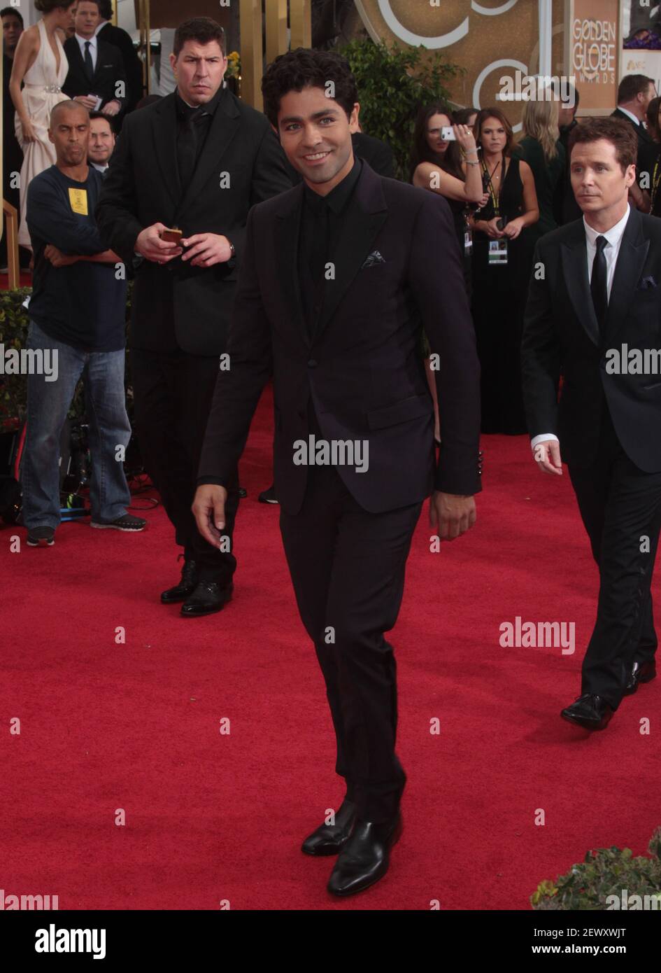 Actor Adrien Grenier arrives at the 72nd Annual Golden Globe Awards ...