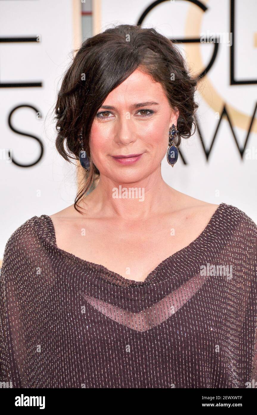 Actress Maura Tierney arrives at the 72nd Annual Golden Globe Awards ...