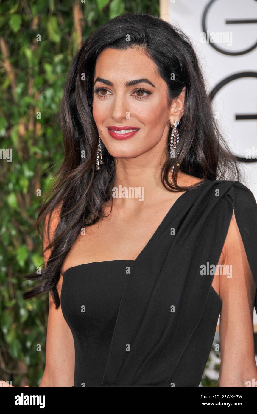 Amal Clooney arrives at the 72nd Annual Golden Globe Awards held at the ...