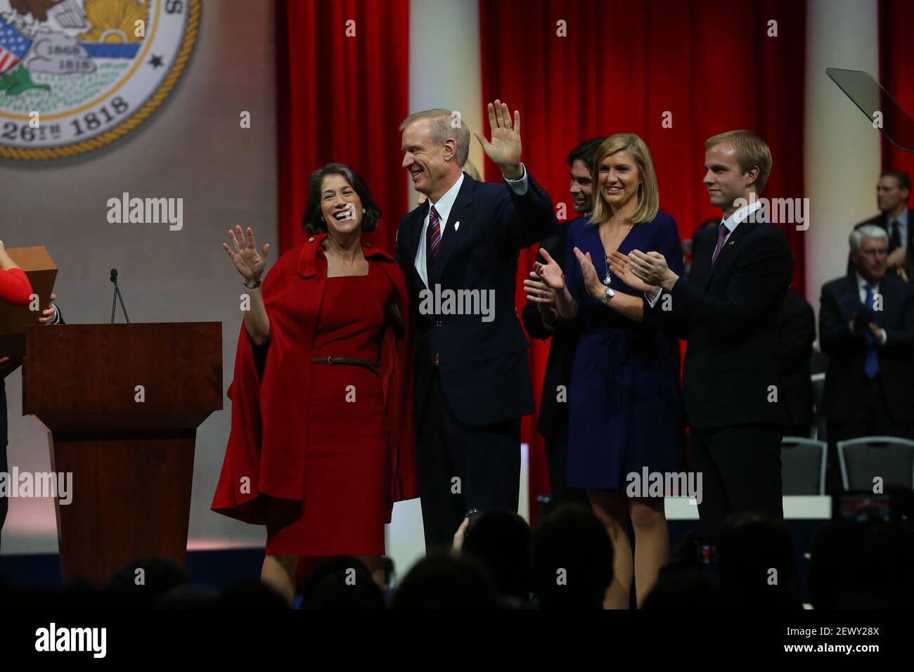 Bruce and Diana Rauner wave to the crowd after he was sworn in as ...