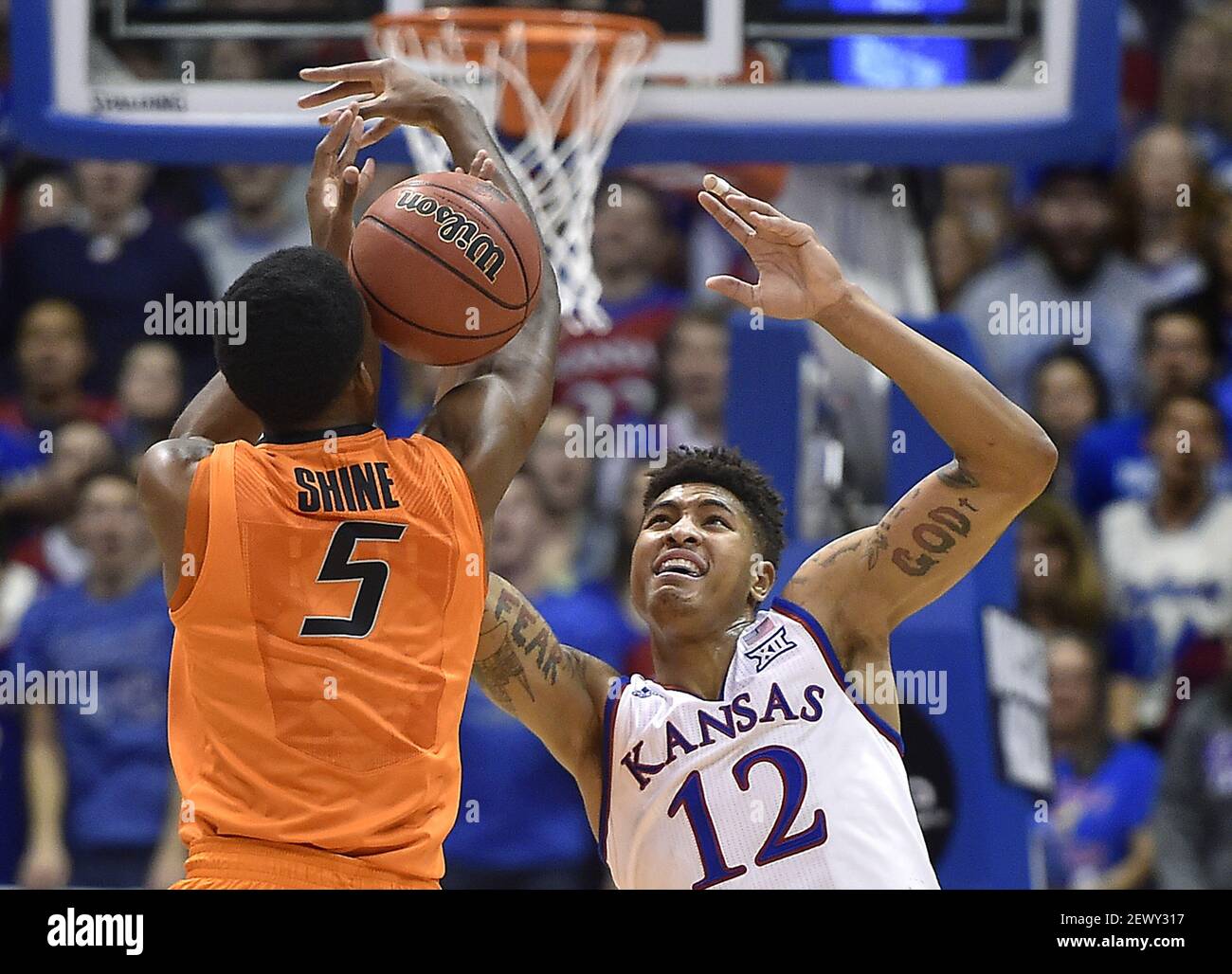 KU's Kelly Oubre Jr. (Photo by 12) knocks the ball away from OSU's ...
