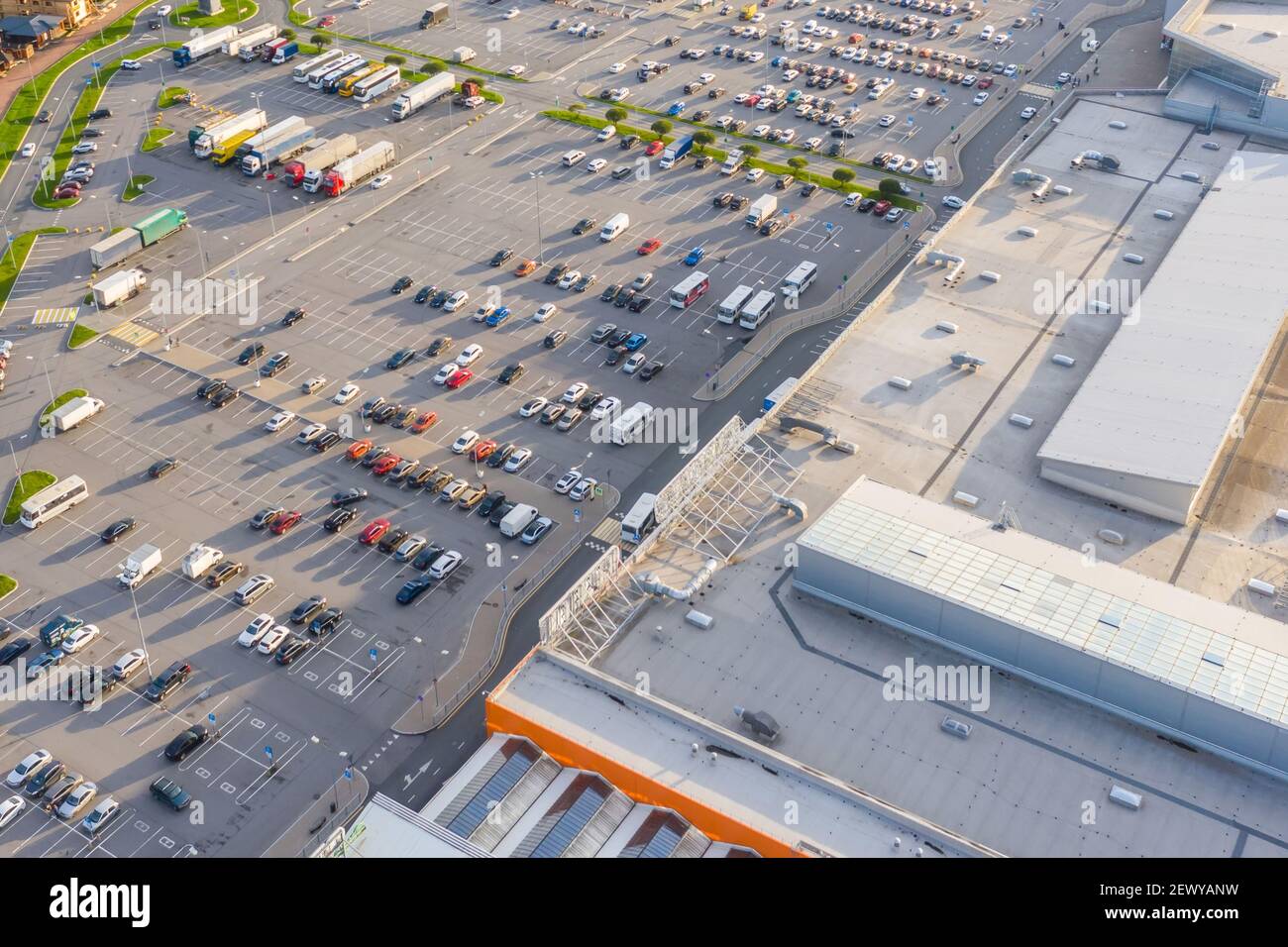 Aerial top down view of the parking lot with many cars of supermarket ...