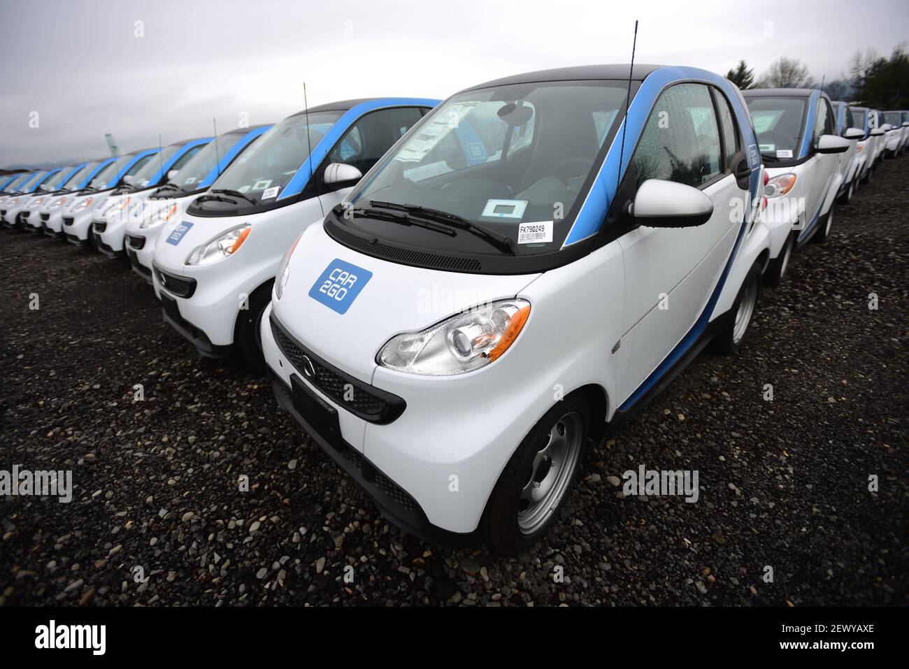 A new fleet of Car2Go vehicles parked near the Daimler facility at the ...