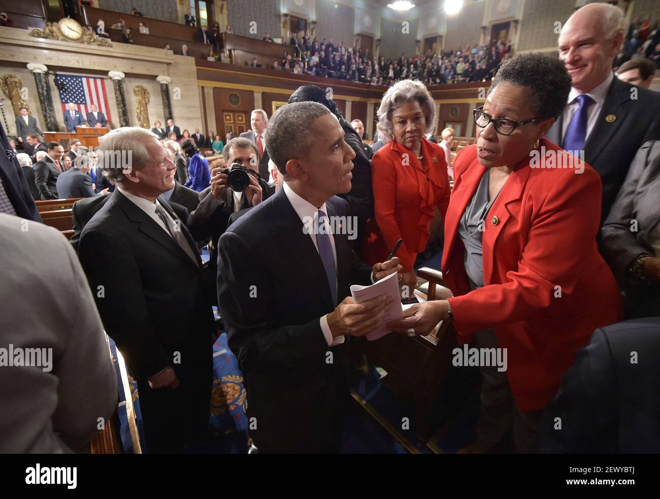 US President Barack Obama signs autographs after delivering the State ...
