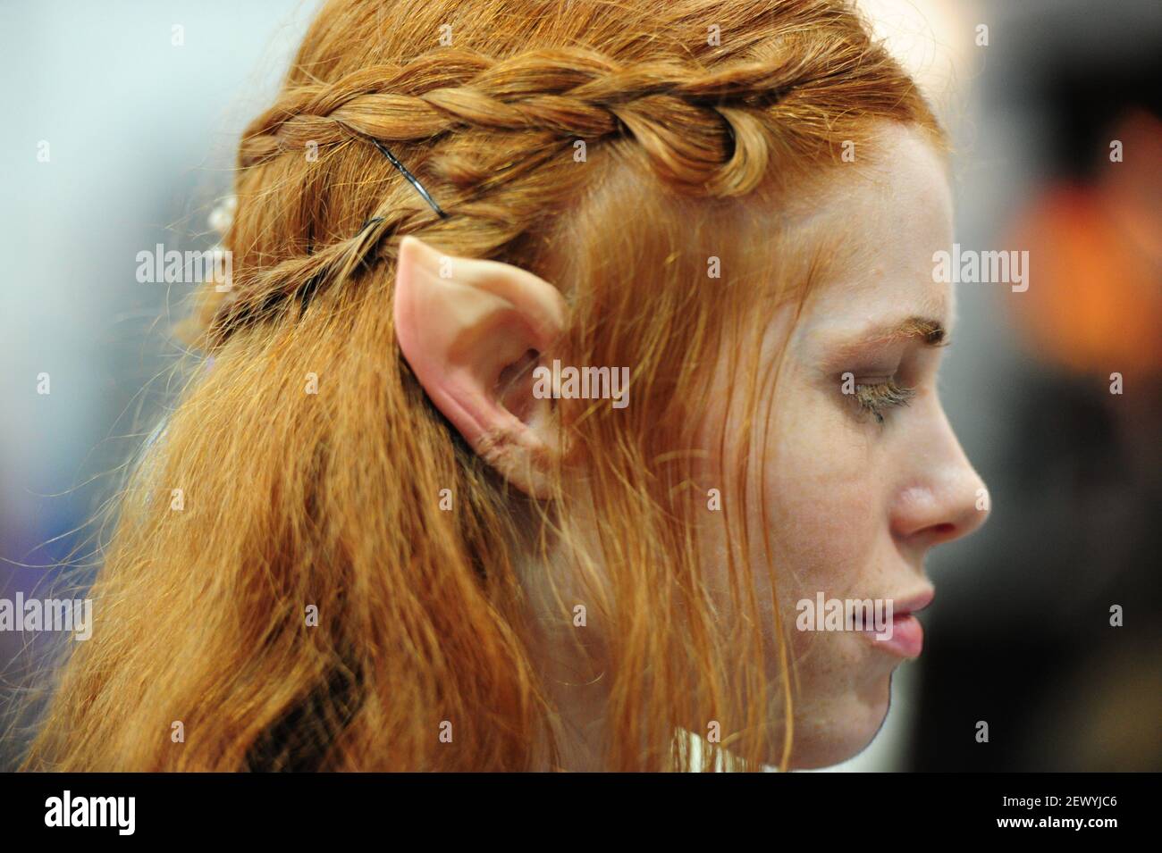 A girl wears an elf ear at Wizard World Comic Con in Portland, Ore., on ...
