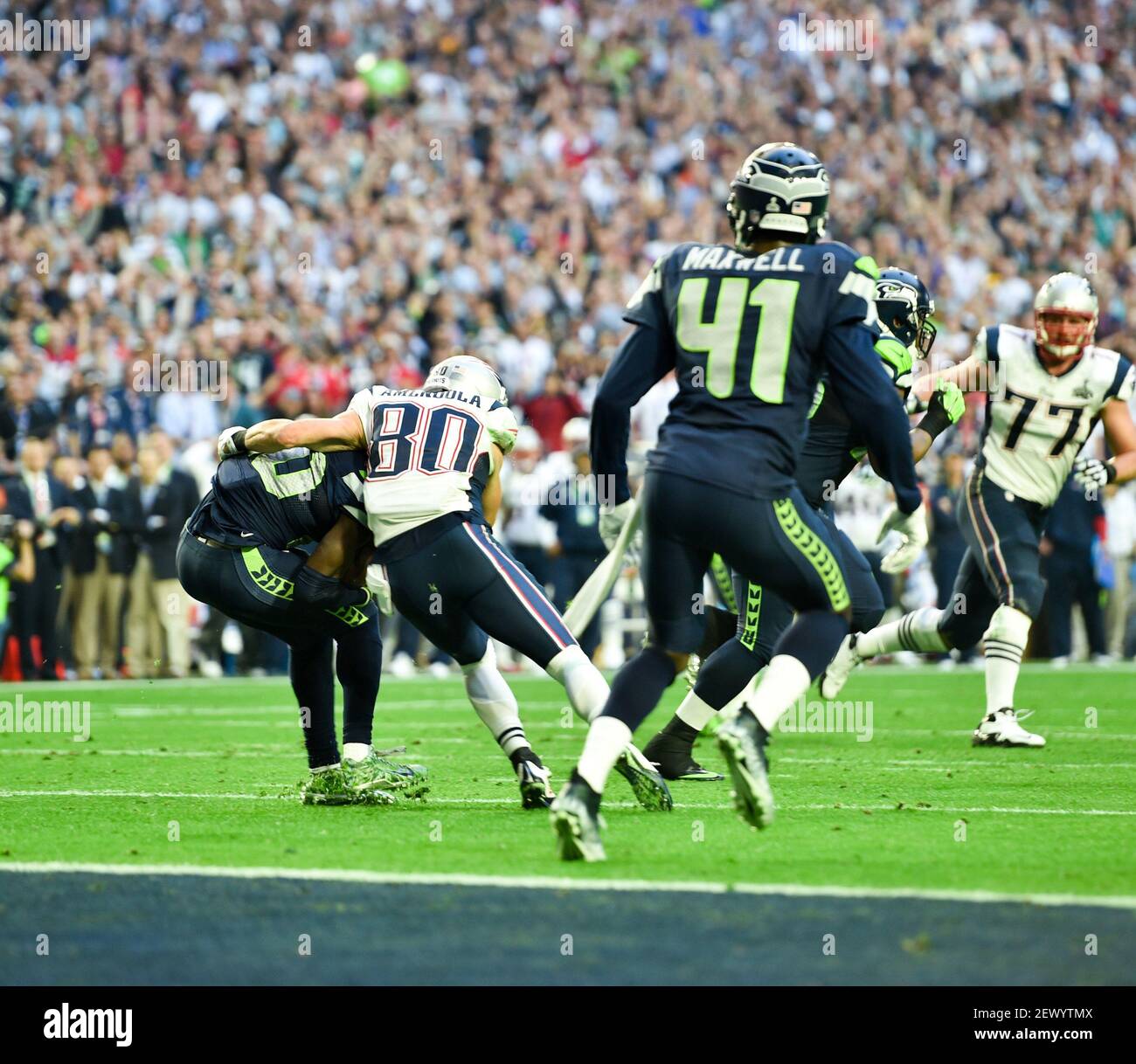 Seattle Seahawks cornerback Jeremy Lane (20) intercepts a Tom Brady ...