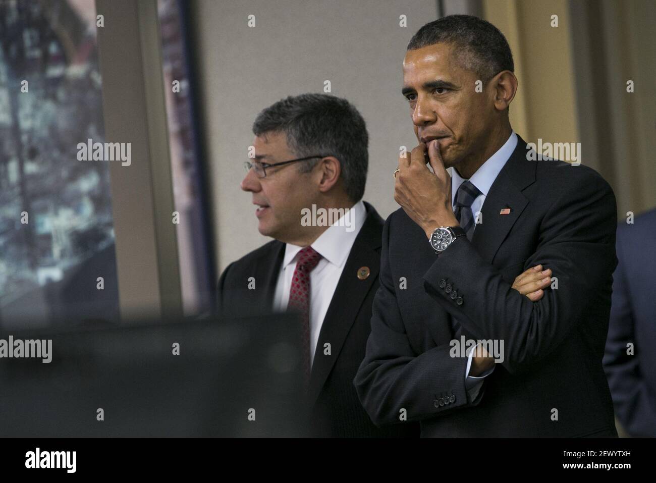 President Barack Obama visits the National Operations Center (NOC) at ...