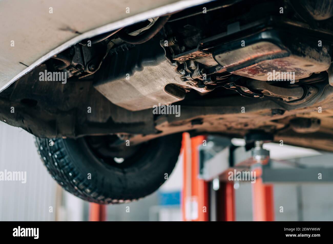 Internal combustion engine bottom view. The machine is lifted on a car ...