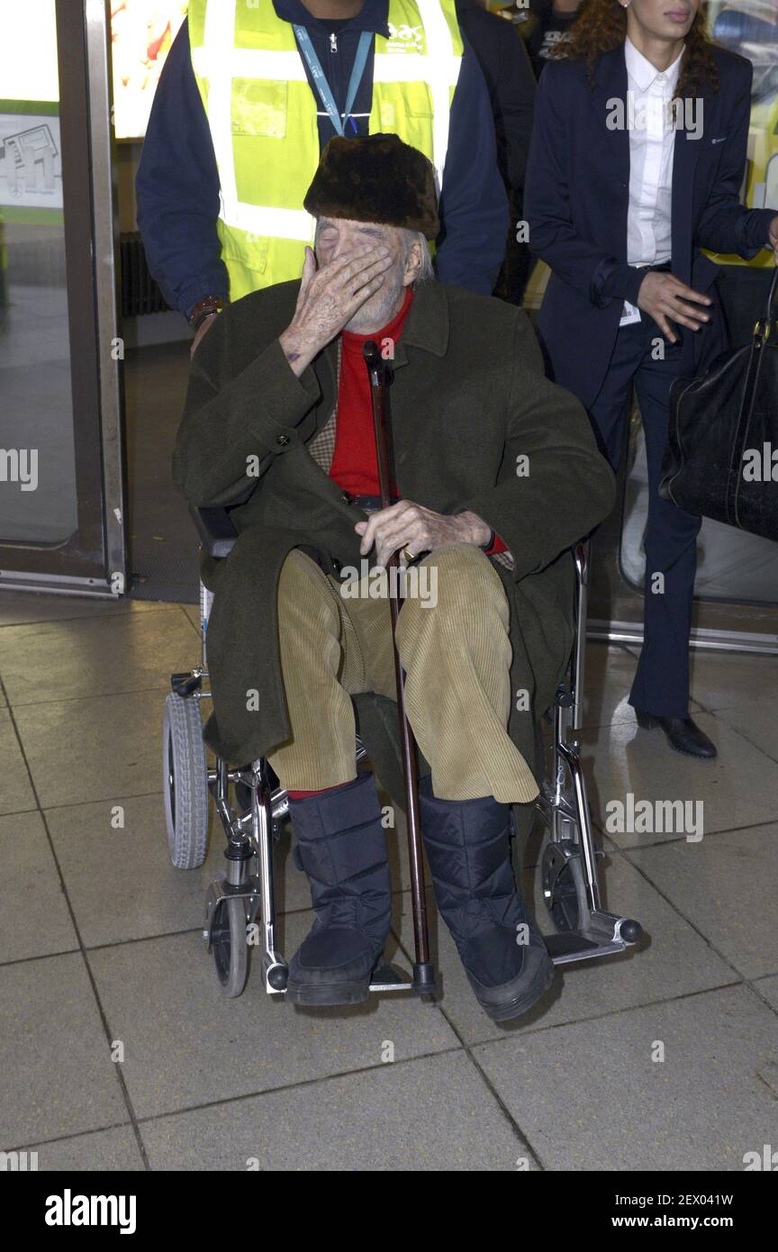 Christopher Lee and his wife Birgit Kroencke arrive at the airport in ...