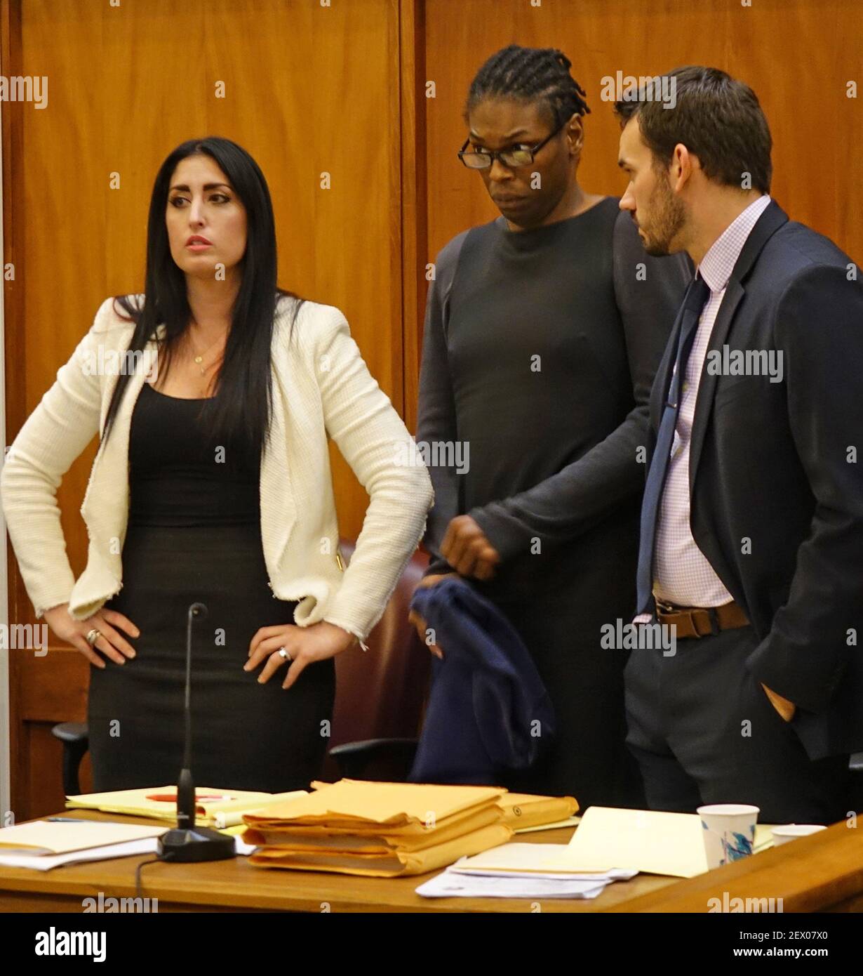 Harold Seymore is flanked by public defender Stacy Marczak, left, and ...