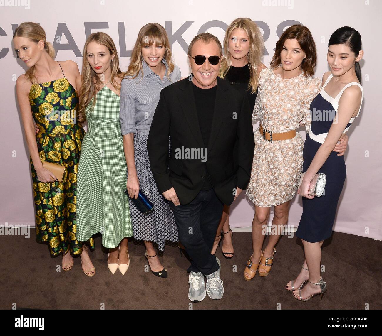 (L-R) Poppy Delevingne, Harley Viera-Newton, Jessica Hart, Michael Kors ...