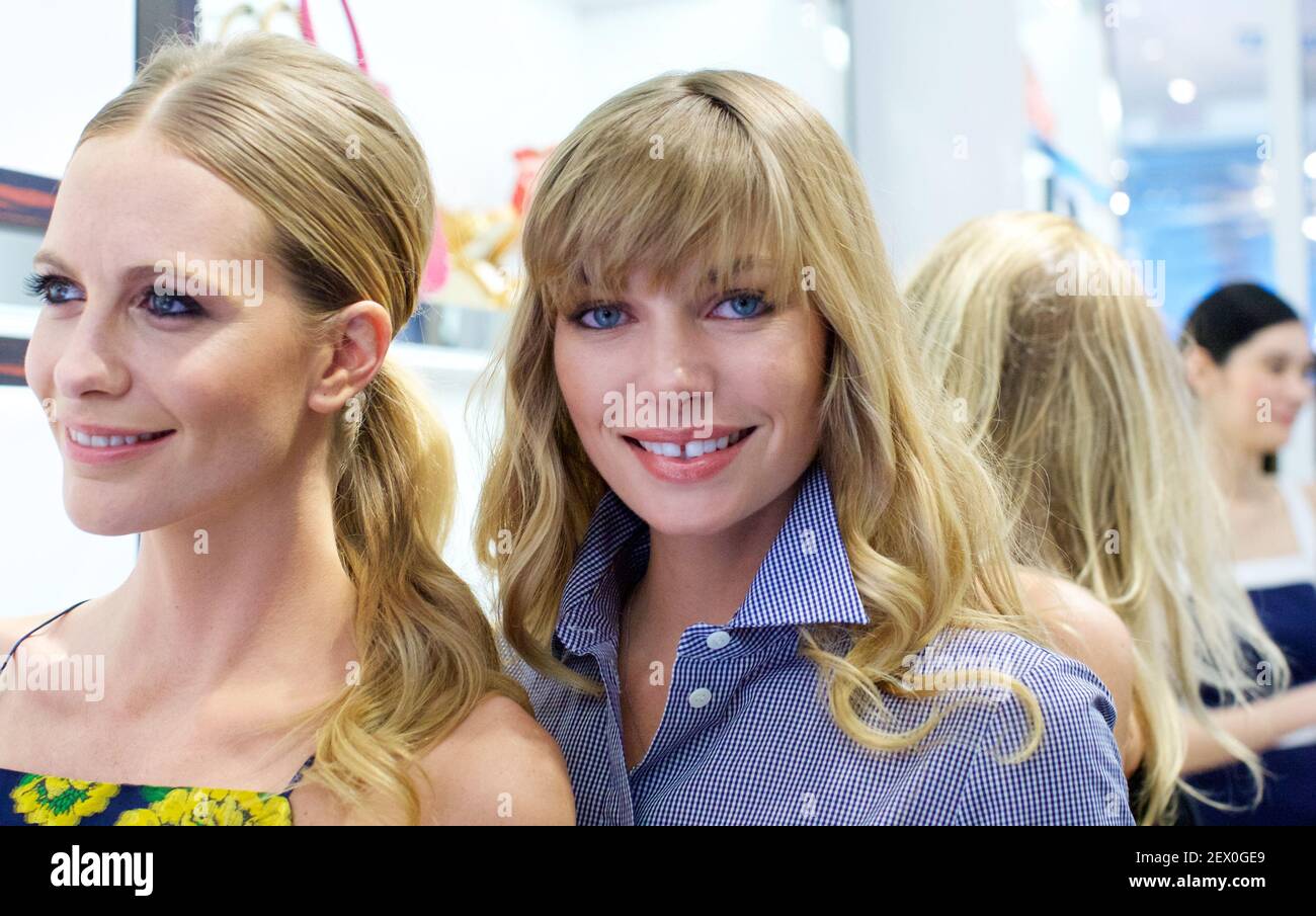 Poppy Delevingne and Jessica Hart attend the Michael Kors launch ...