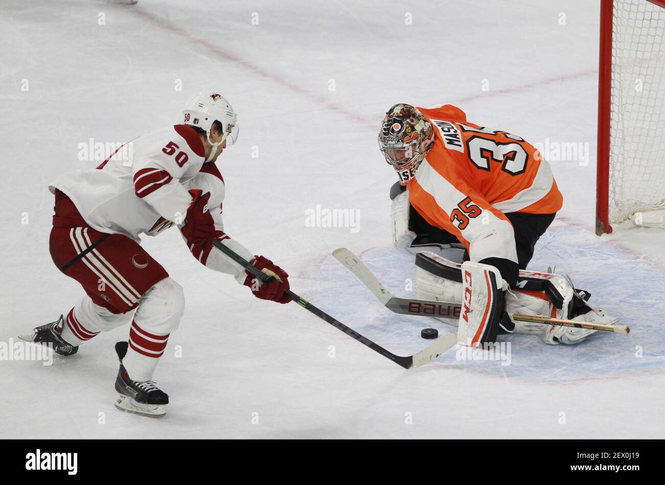 Philadelphia Flyers goalie Steve Mason stops a shot by Arizona Coyotes ...