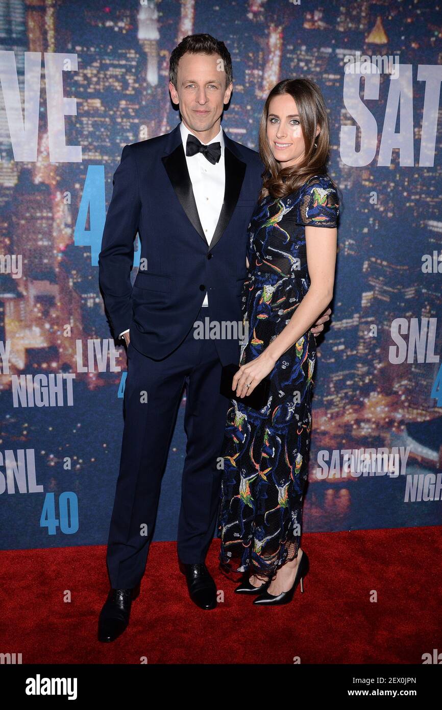(L-R) Actor and talk show host Seth Meyers along with his wife Alexi ...