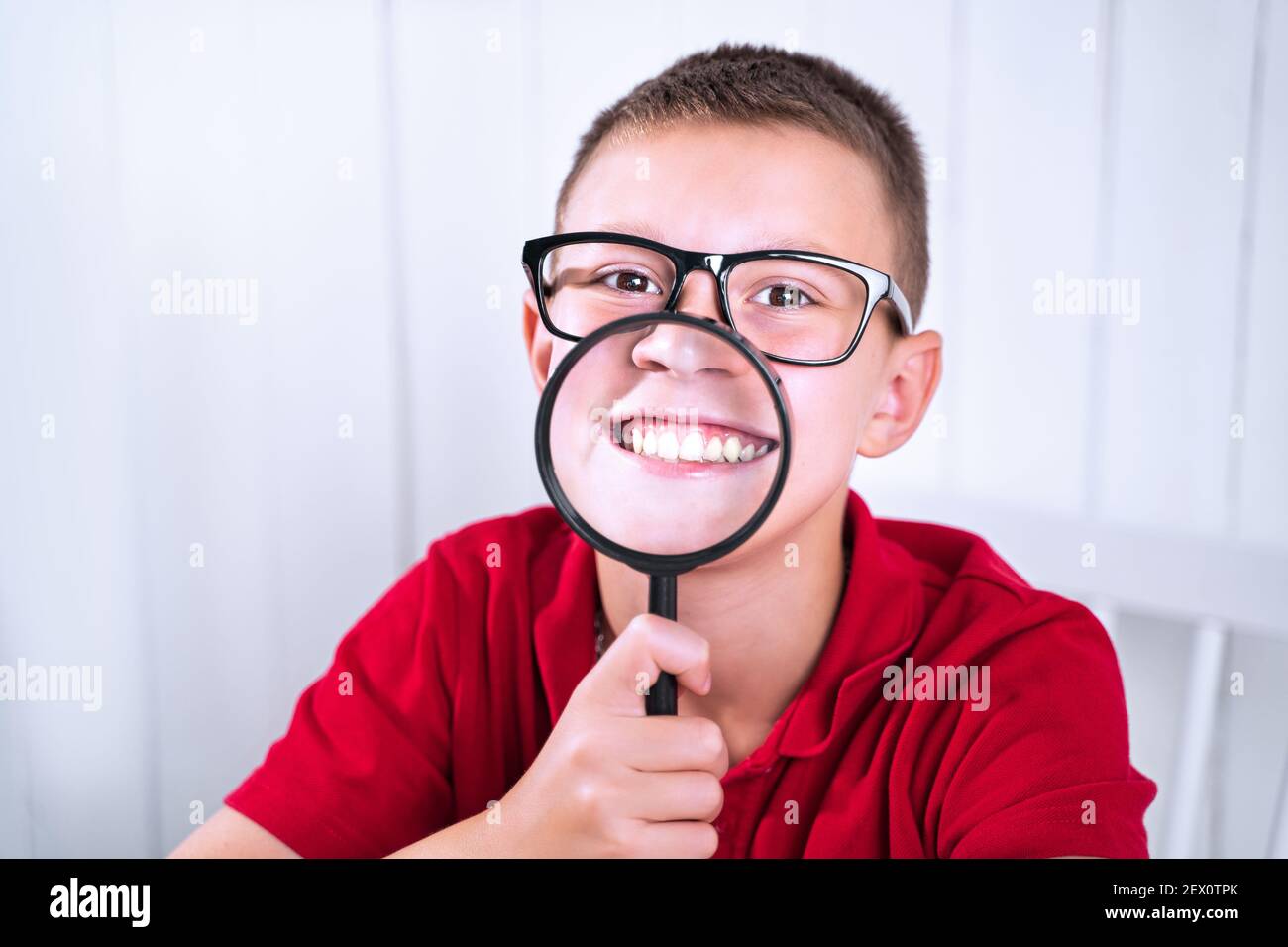 Little school boy express positive and negative emotions through a ...