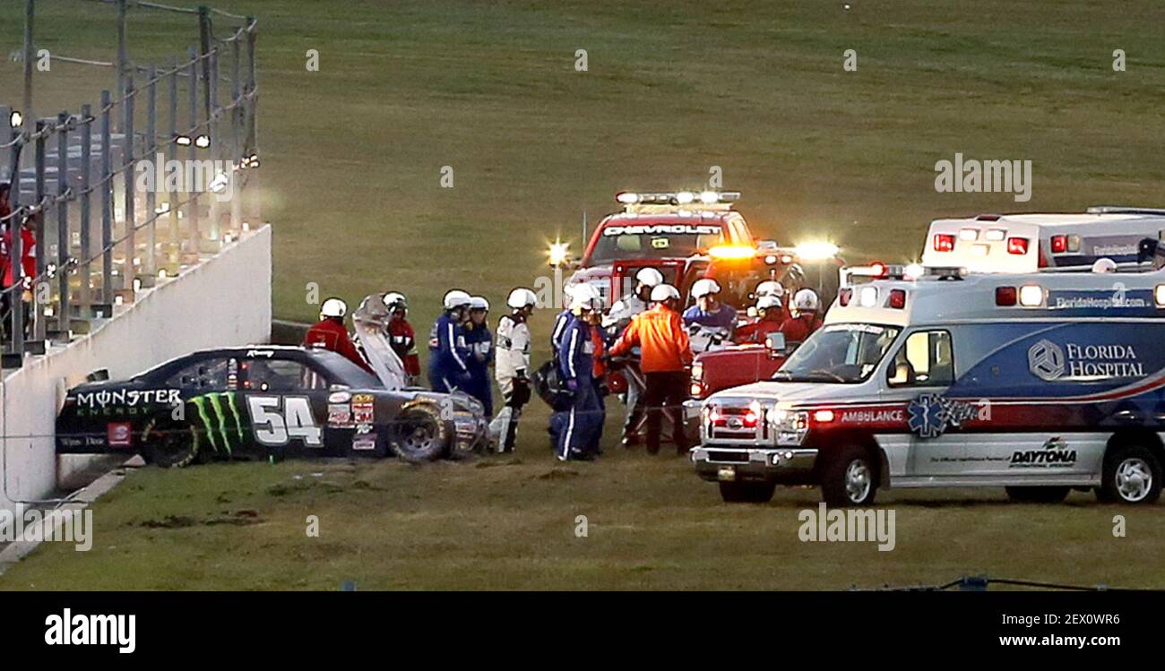 Kyle Busch is loaded into an ambulance after a crash during the the ...