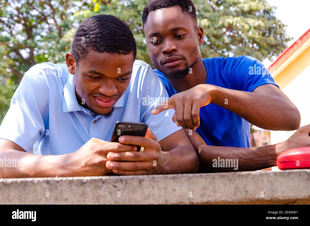 two handsome african feeling excited about what they saw on their ...