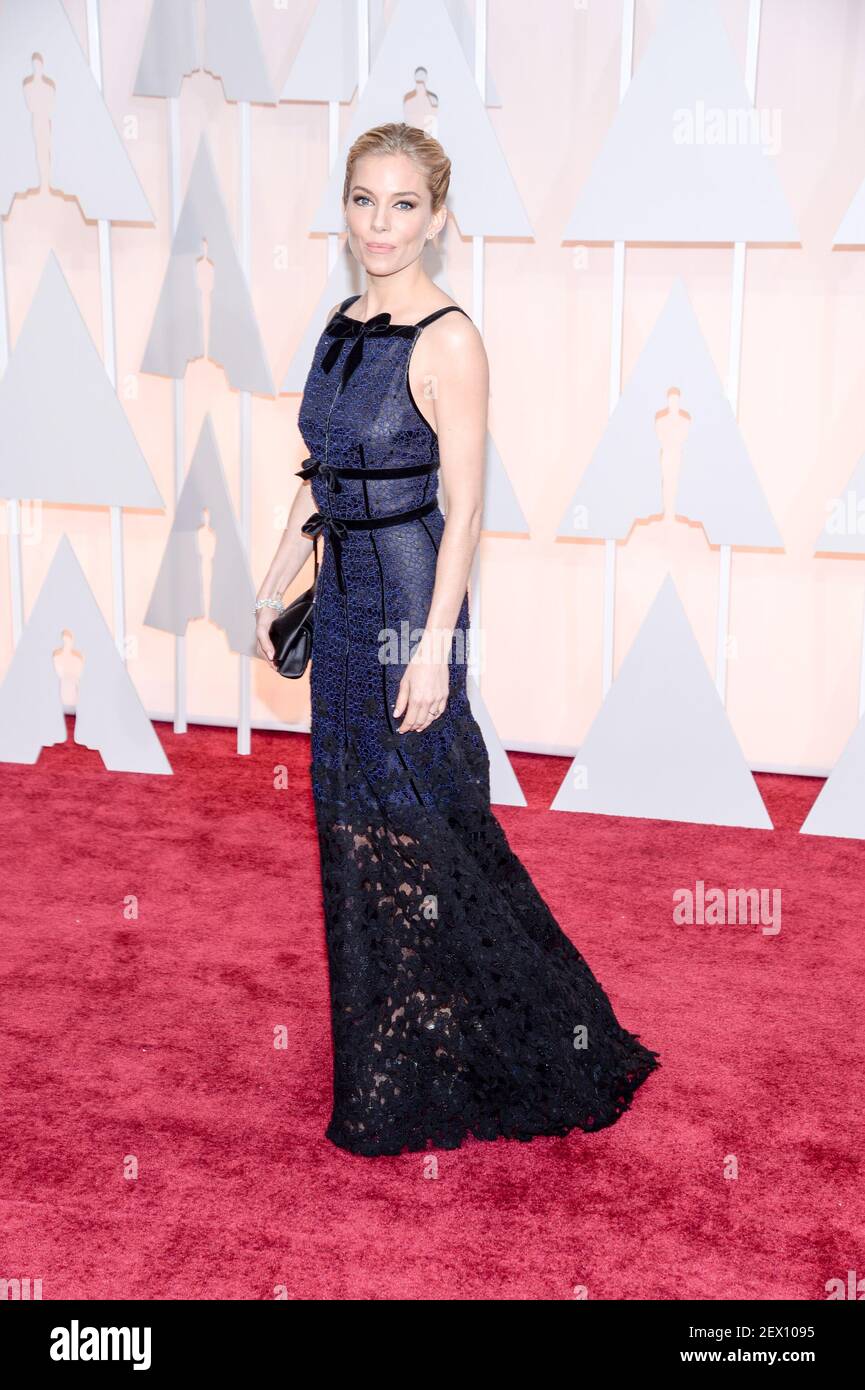 Actress Sienna Miller arrives at the 87th Annual Academy Awards held at ...