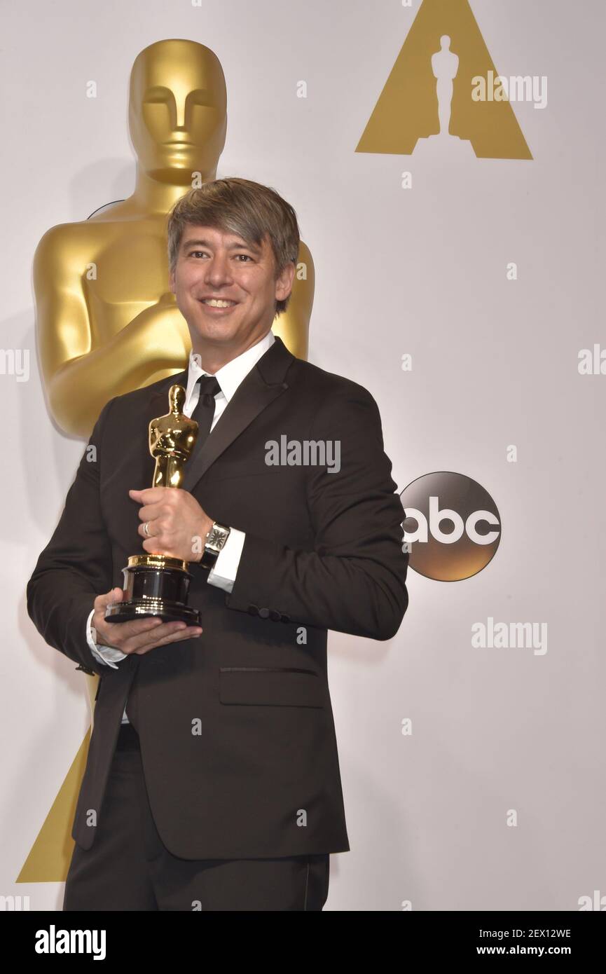 Tom Cross attends the 87th Annual Academy Awards, held at Hollywood and ...