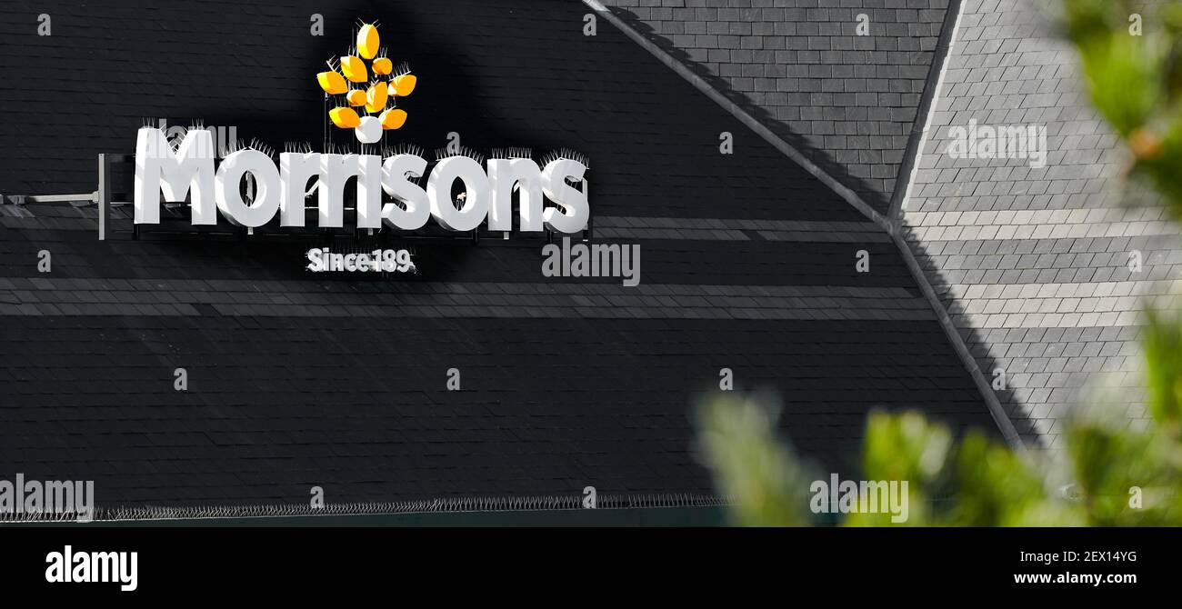 Sign and symbol on the roof of a Morrisons supermarket Stock Photo - Alamy
