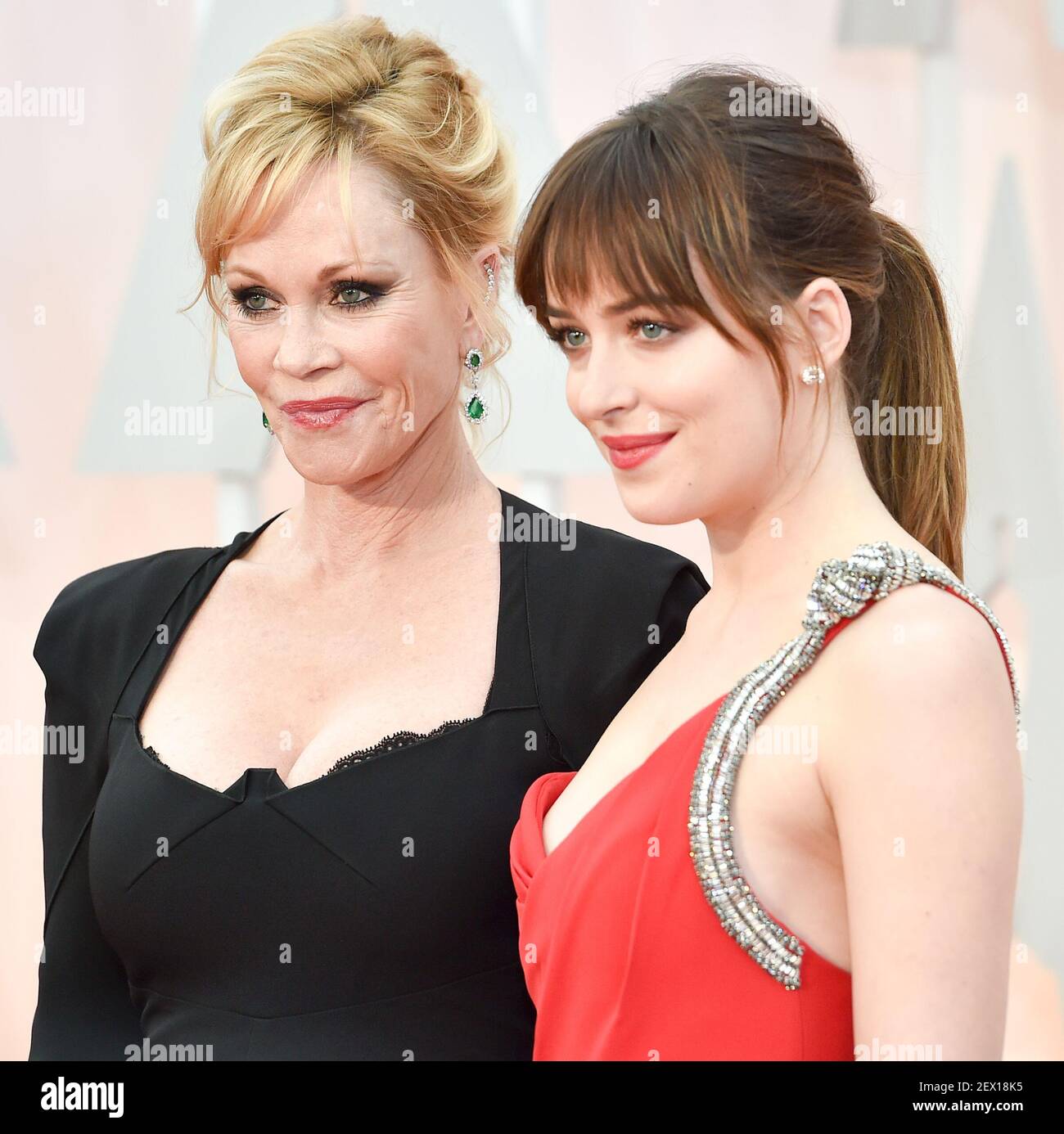 Melanie Griffith poses with her daughter Dakota Johnson at the 87th ...