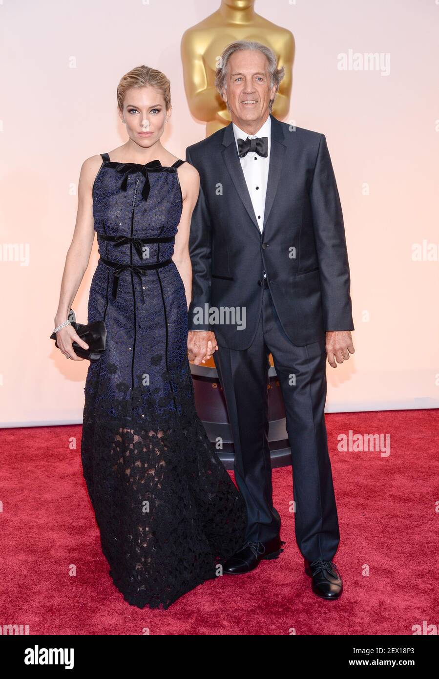 Actress Sienna Miller arrives at the 87th Annual Academy Awards held at ...