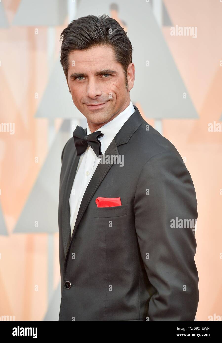 Actor John Stamos arrives at the 87th Annual Academy Awards held at the ...