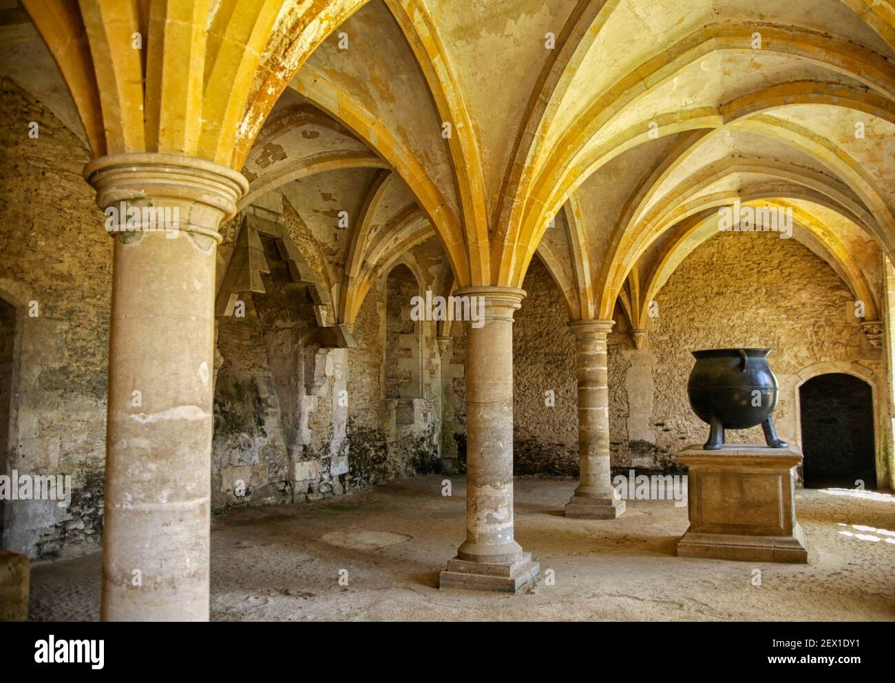Medieval kitchen in Lacock Abbey in Wiltshire with cauldron used as ...