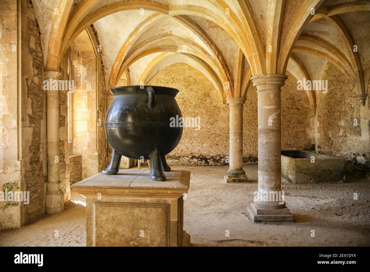 Medieval kitchen in Lacock Abbey in Wiltshire with cauldron used as ...