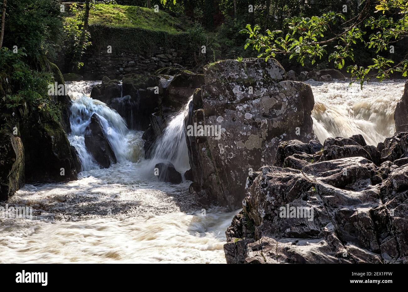 Waterfalls and river running through Betws-y-Coed, Snowdonia, North ...