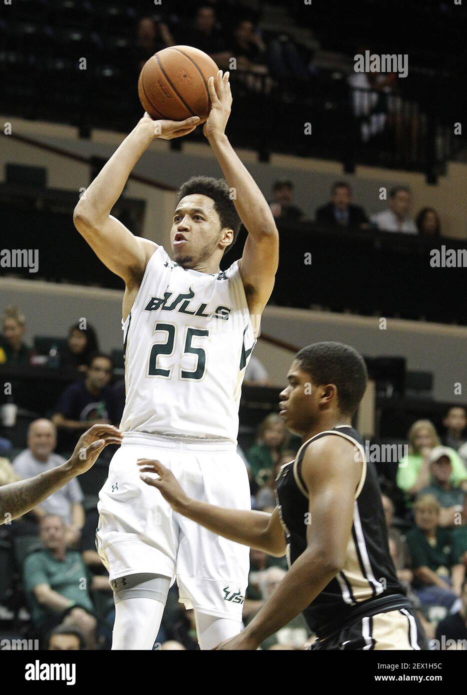 South Florida's Troy Holston Jr. (Photo by 25) shoots a 3-pointer in ...