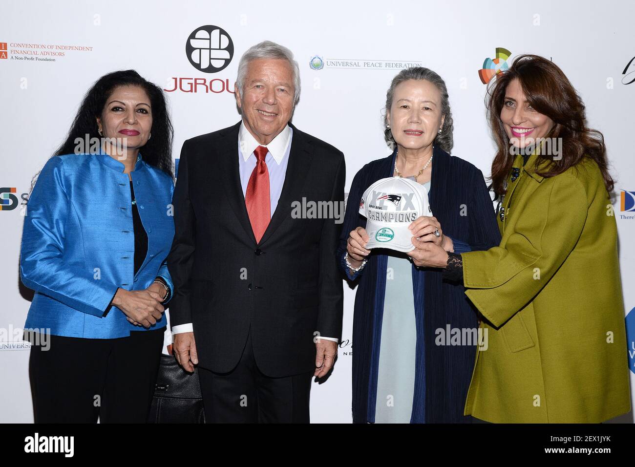 (L-R) Lakshmi Puri, Assistant Secretary-General UN Women, NFL Team ...