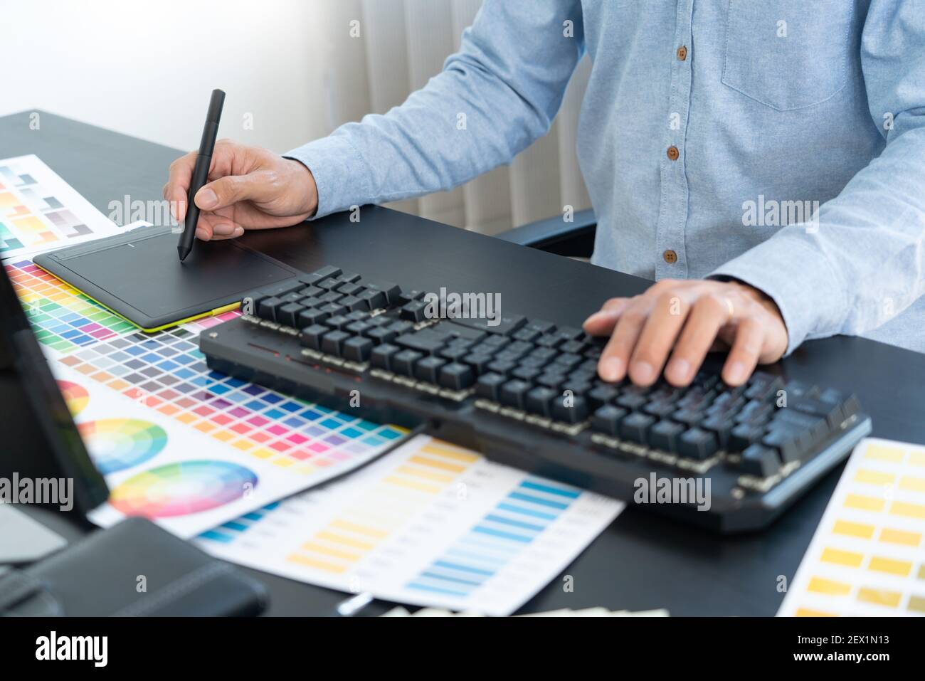 interior designer or creative graphic designer working on project ...
