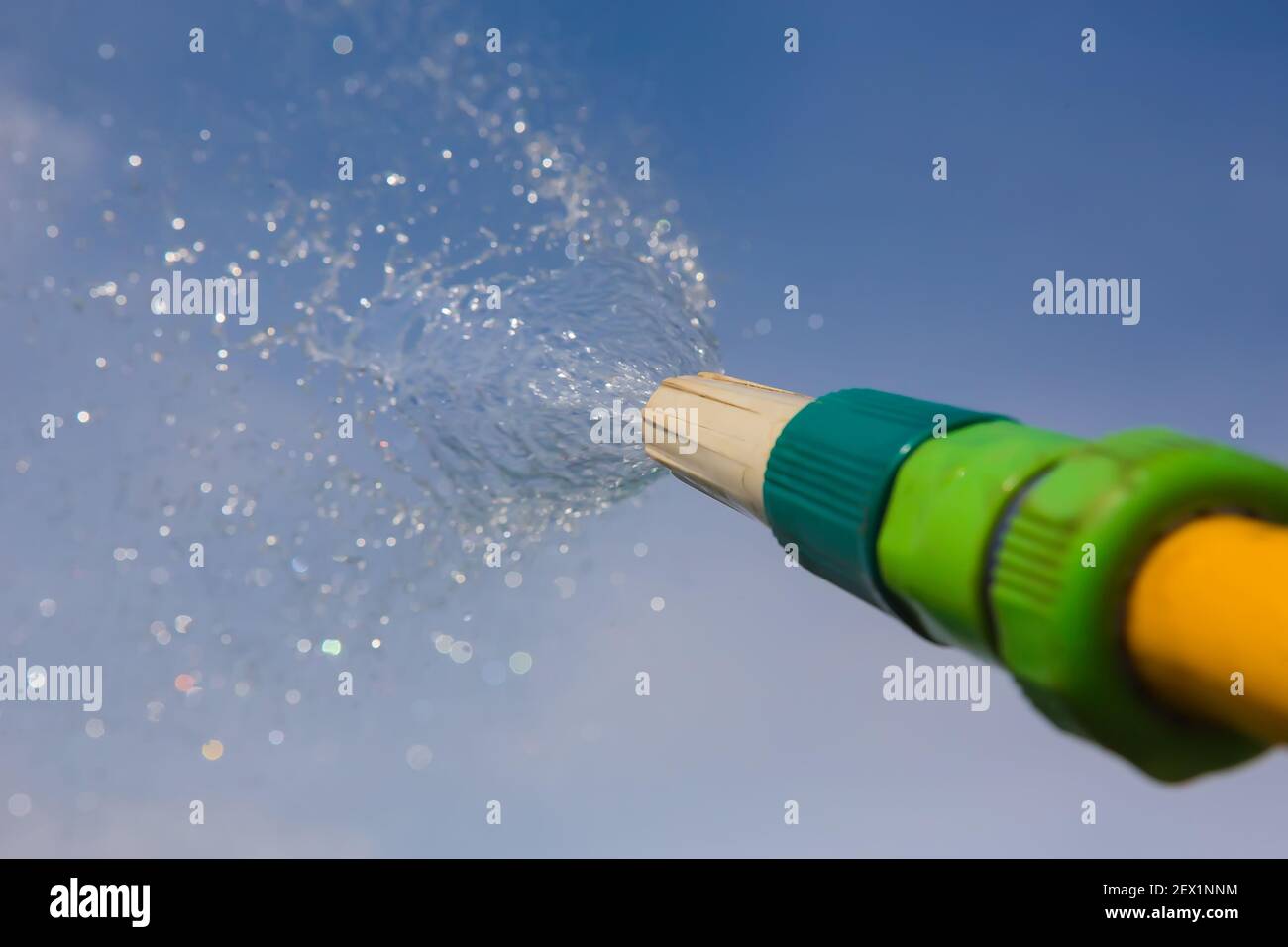 Water sprayed from sprinkler hi-res stock photography and images - Alamy