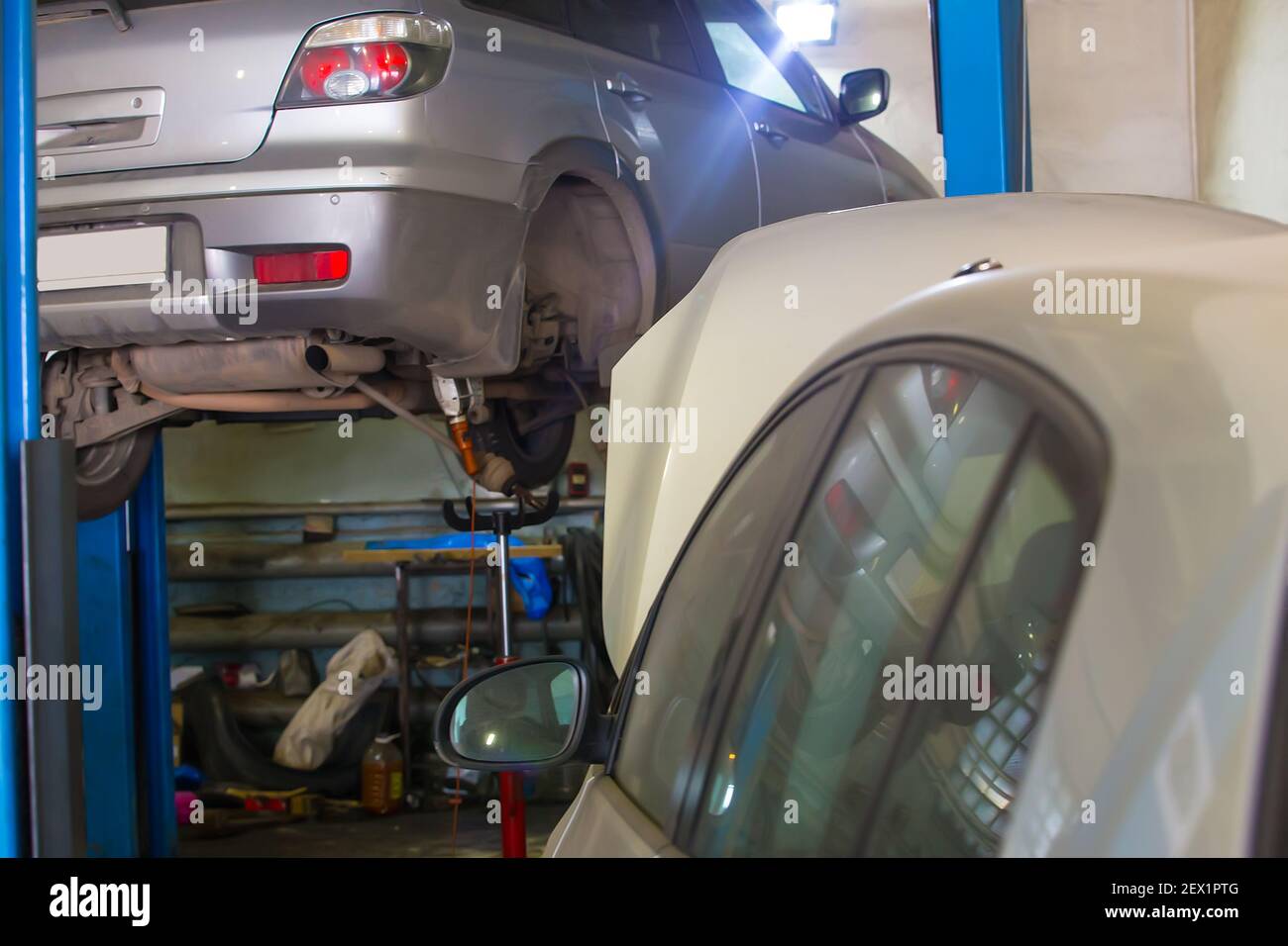 Car repair station interior and car Stock Photo - Alamy