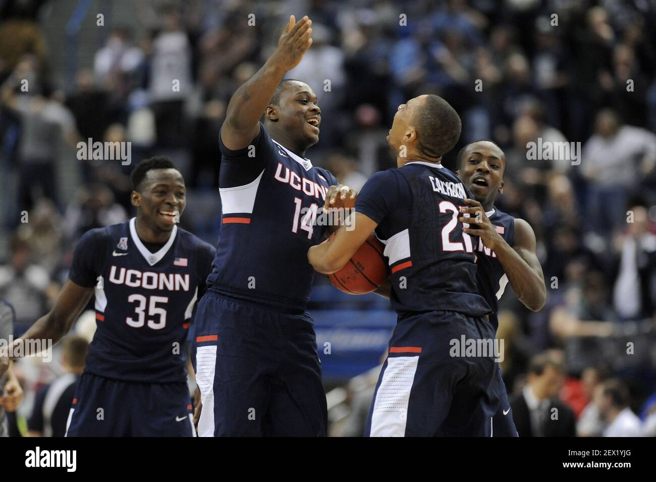 Connecticut's Amida Briham (35), Rakim Lubin (14) and Terrence Samuel ...