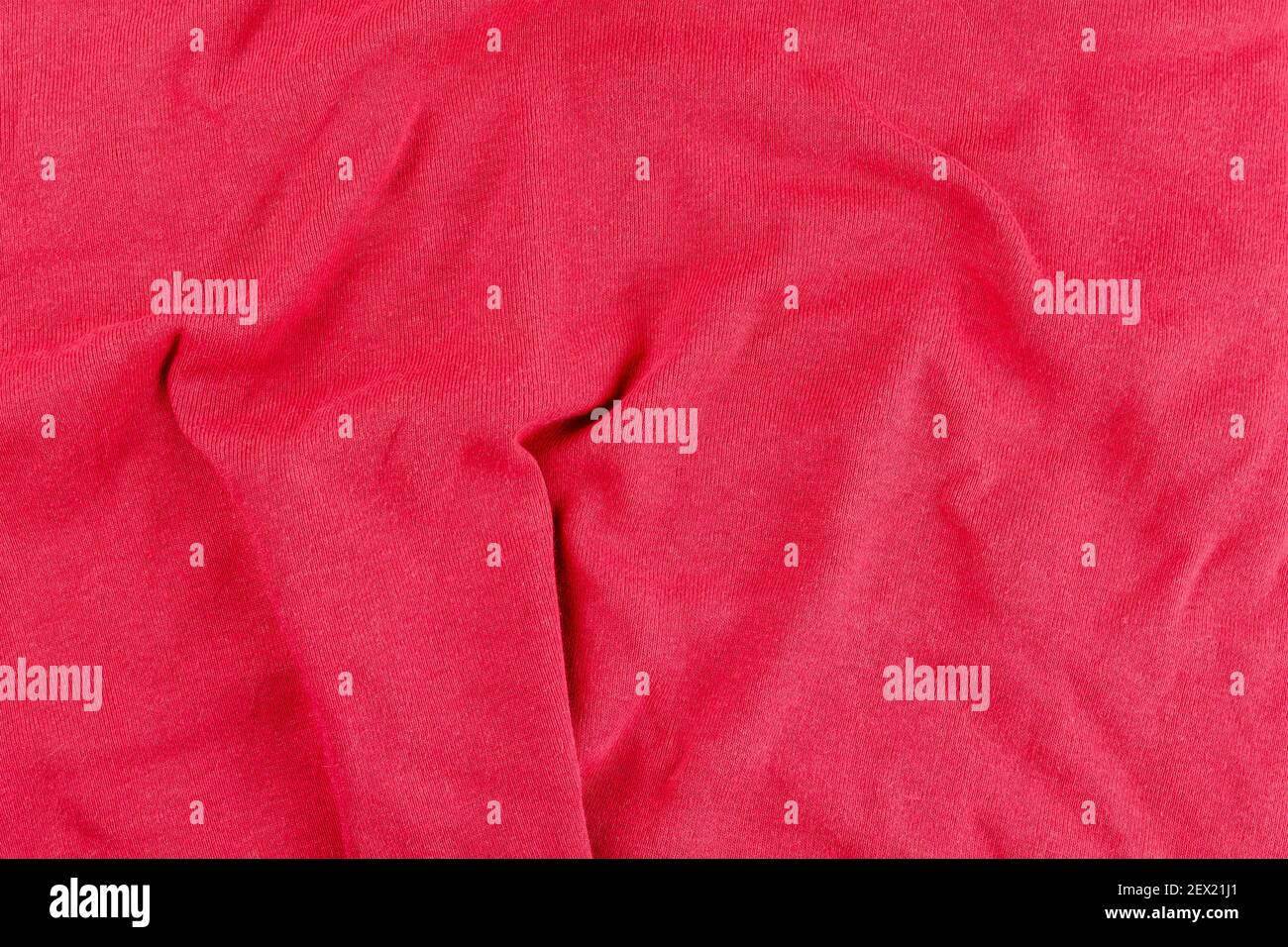 Crumpled red cloth background. Crumpled cotton shirt. Abstract ...