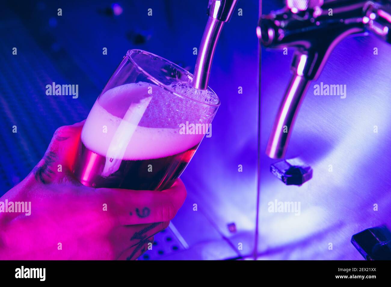 Bartender beer pumps hi-res stock photography and images - Alamy