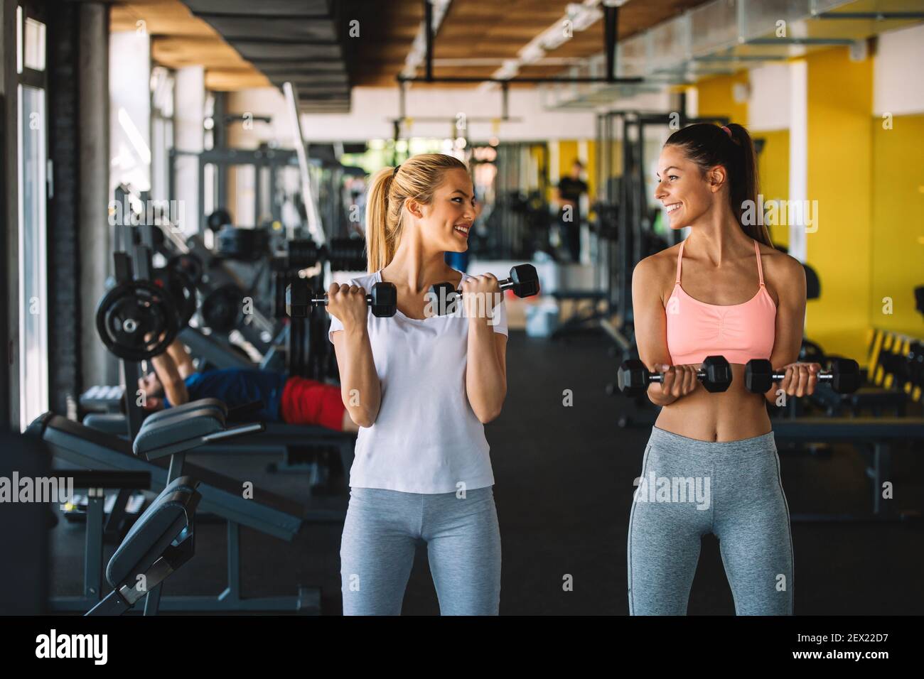 Beautiful fit women working out in gym to stay healthy Stock Photo - Alamy