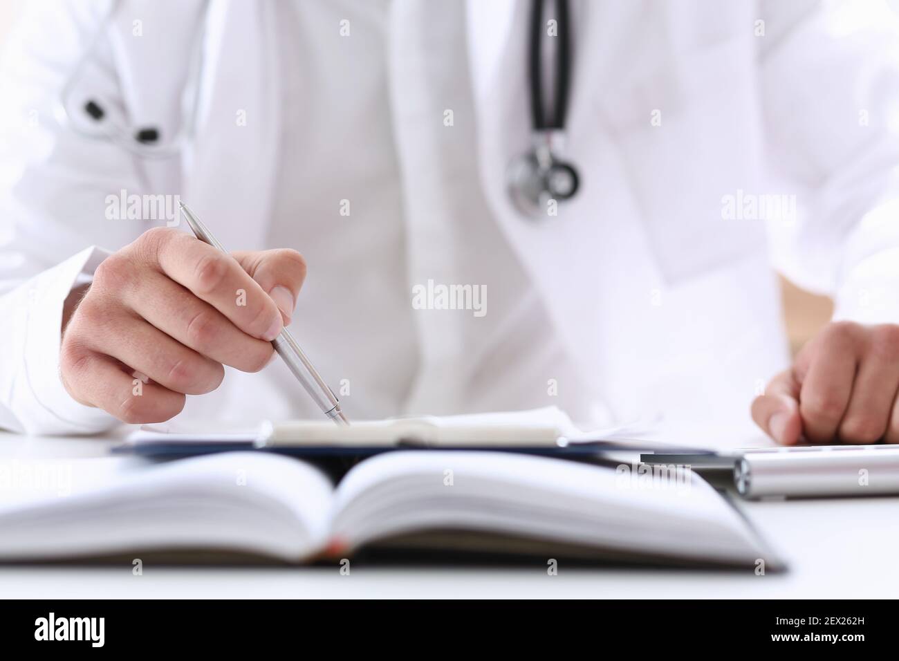 Hand filling medical history hi-res stock photography and images - Alamy