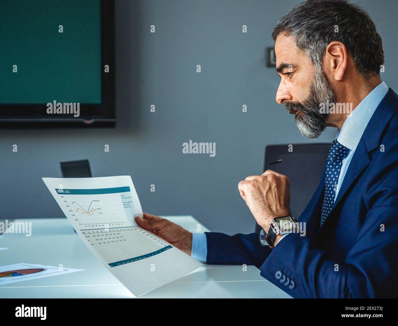 Handsome mature businessman, leader working in the office Stock Photo ...