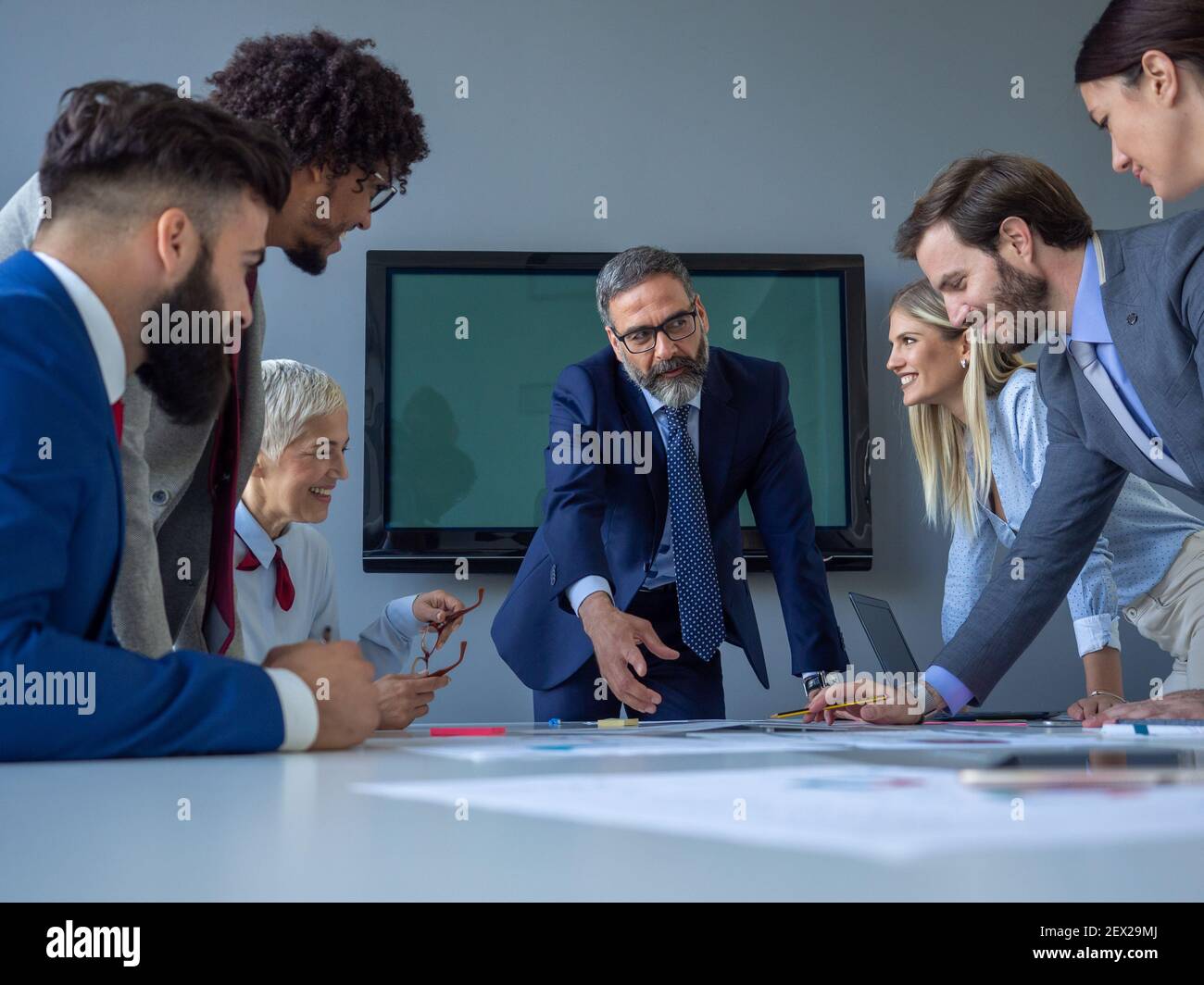 Corporate business team and manager in a meeting Stock Photo - Alamy