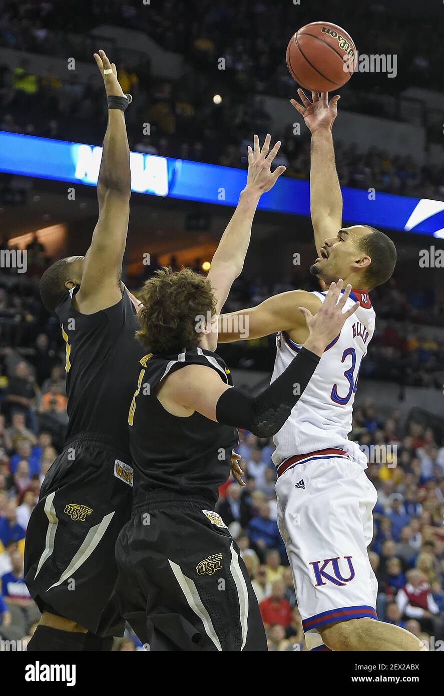 Kansas Jayhawks forward Perry Ellis (34) takes a shot over Wichita ...