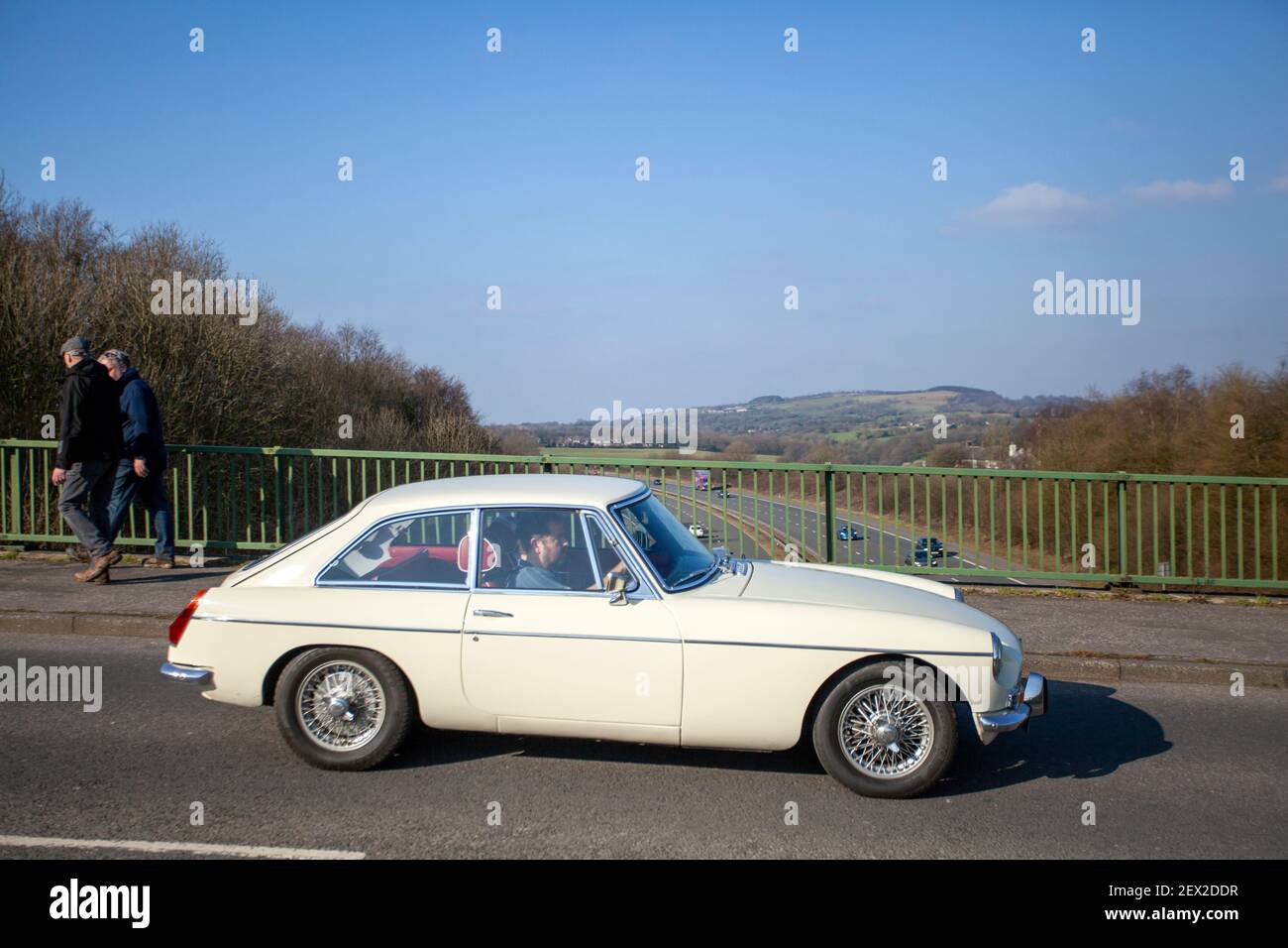 1972 70s white MG B Gt 1798cc; Vehicular traffic, moving vehicles, cars ...